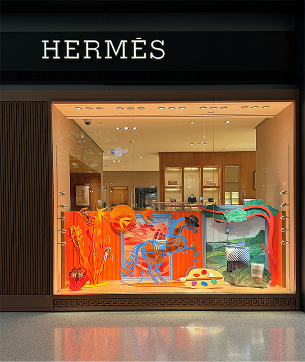 Hermès windows display in North America and France airports